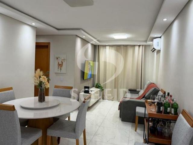 Vende apartamento na Praia Grande Cidade Ocian com 2 quartos sendo 1 suíte