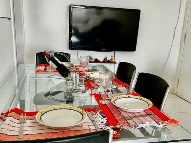 Vende apartamento semi mobiliado de 01 dormitório, sacada, elevador, e vaga garagem