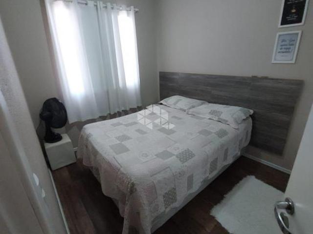 Vende casa em condominio 2 dormitórios, vaga de garagem em Gravatai