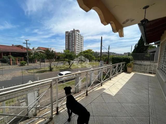 Vende casa 4 dormitórios com 2 vagas de garagem partenon