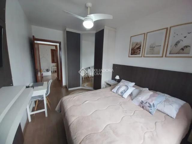 Vende excelente apto semi mobiliado com 2 dormitórios, 68m² de área privativa, bairro Niterói em Ca
