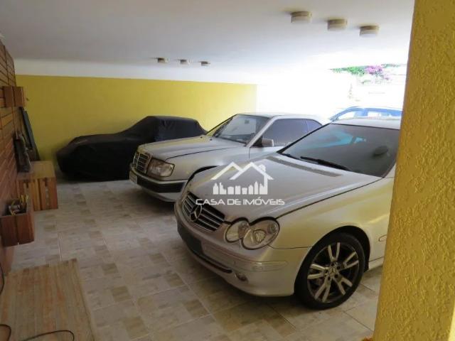 Vende ou aluga casa térrea com 4 suítes, piscina e churrasqueira