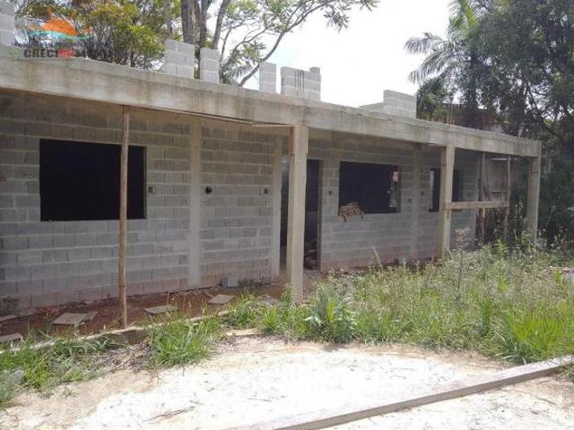 vende se um terreno com casa inacabada