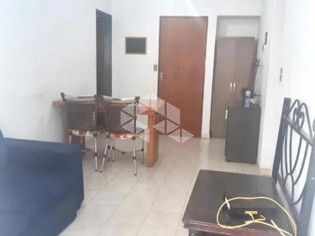 VENDE SE APARTAMENTO CENTRO. 3 DORMITÓRIOS 2 BANHEIROS