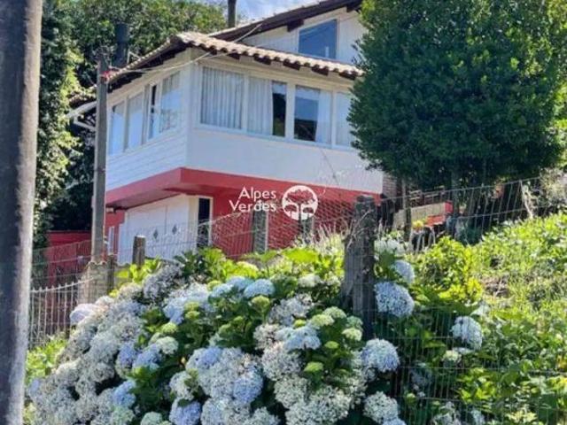 VENDE SE CASA COM 03 QUARTOS NA CIDADE DE GRAMADO, A 05 MINUTOS DO CENTRO