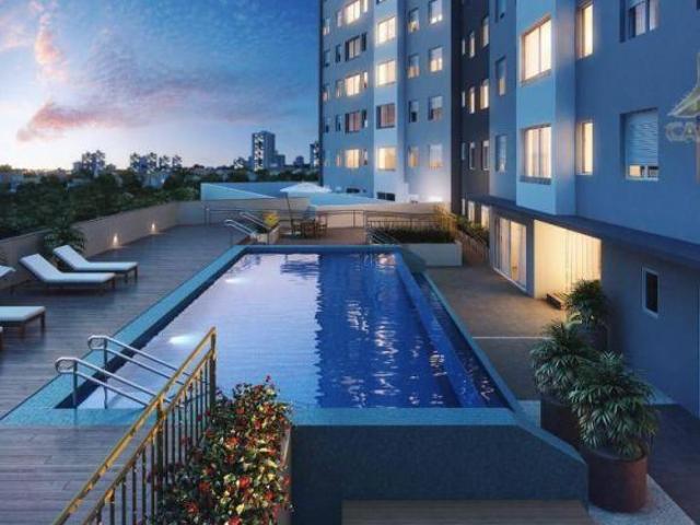 Vendo apartamento novo de dois dormitórios, suíte, garagem e elevador no Bairro Partenon em Porto Al