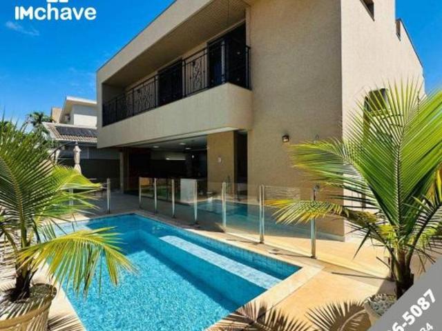 Vendo Casa no Eco Village II com 5 suítes, piscina, Energia Solar, Fino Acabamento e Rica em Armário