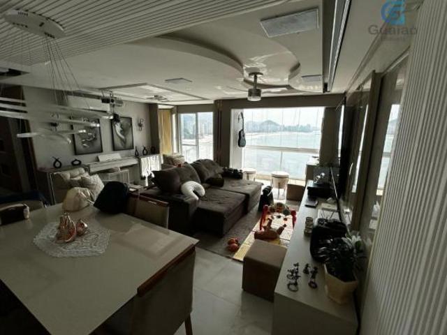 Vendo lindo Apartamento mobiliado de 2 dormitórios e 2 vagas frente ao mar da As
