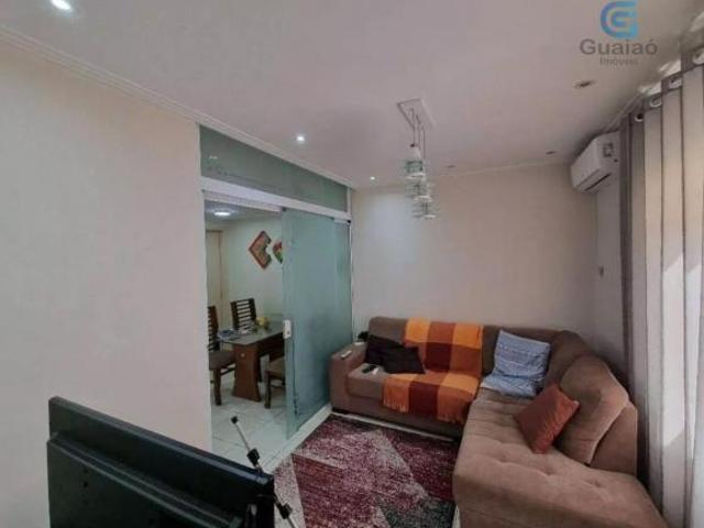 Vendo Sobrado em Condomínio Fechado com 2 Dormitórios na Vila Voturuá, São Vicen
