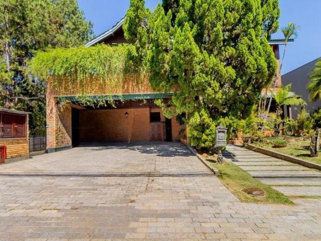 Deslumbrante casa em condomínio para venda com 5 quartos, sendo 5 suítes, 852m²