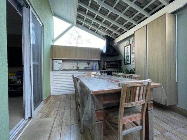 Village com 4 dormitórios à venda, 106 m² por R$ 1.250.000,00 Jardim São Lourenço Bertioga/SP