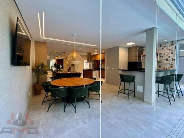 Village com 6 dormitórios à venda, 310 m² por R$ 7.100.000,00 Riviera Módulo 17 Bertioga/SP