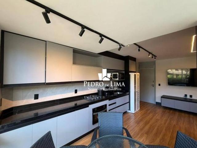 Village com 1 dormitório à venda, 48 m² por R$ 1.100.000 Riviera Módulo 26 Bertioga/SP