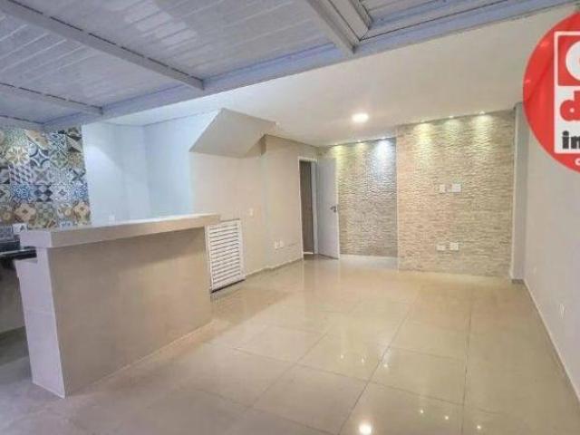 Village com 2 dormitórios à venda, 106 m² por R$ 570.000,00 Marapé Santos/SP