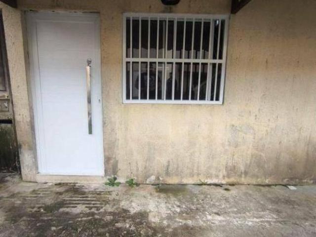 Village com 2 dormitórios à venda, 47 m² por R$ 270.000 Centro Bertioga/SP