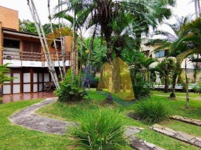 Village com 3 dormitórios à venda, 130 m² por R$ 2.200.000,00 Riviera Módulo 21 Bertioga/SP