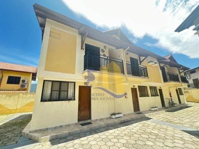 Village com 3 dormitórios à venda, 65 m² por R$ 570.000 Centro Bertioga/SP