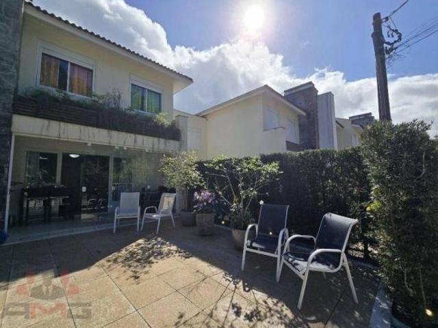 Village com 3 dormitórios à venda, 94 m² por R$ 1.590.000,00 Riviera Módulo 28 Bertioga/SP