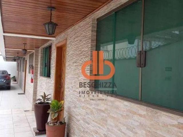 Village com 3 dormitórios à venda, 99 m² por R$ 640.000,00 Macuco Santos/SP