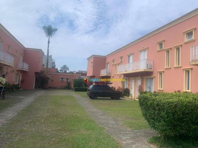 VILLAGE EM CONDOMÍNIO FECHADO EM BERTIOGA – R$ 640.000
