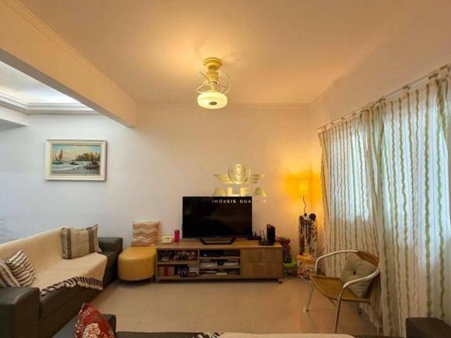 Villagio triplex com solarium e varanda gourmet na Praia do Tombo – Alfa Imóveis Guarujá