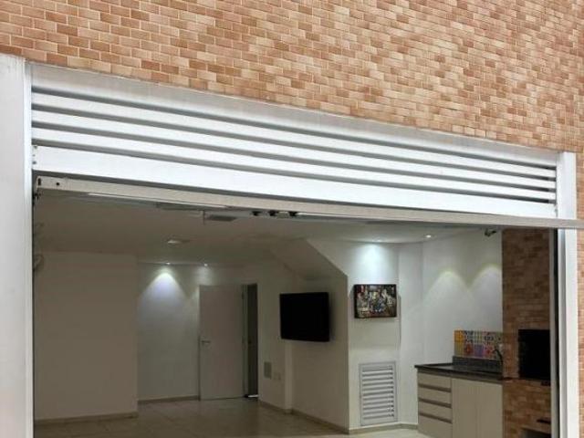 Villagio Di Firenze Casa em Villaggio no Marapé com 2 suítes e piscina