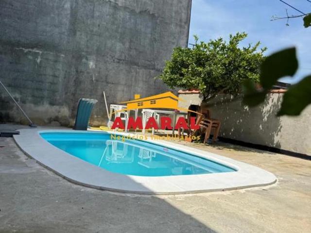 Viva Momentos Inesquecíveis: Casa com Piscina e Lazer Completo! Conforto, espaço e o quintal dos seu