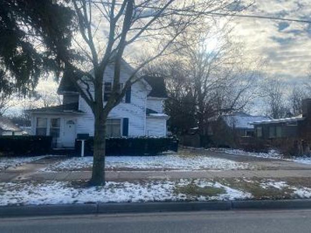 W Division St