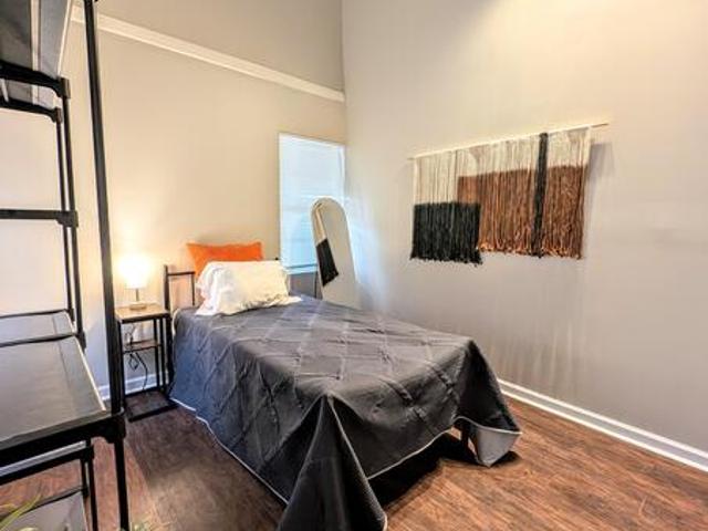 Walk to bus stops + minutes to MARTA station + 10 memory foam mattresses + work space in each room