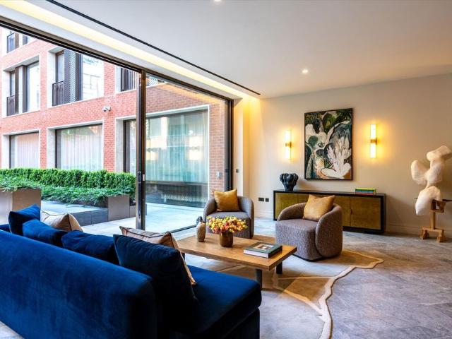 An exceptional four‑bedroom apartment within the prestigious One Carrington, W1