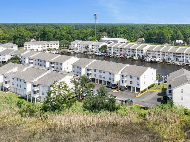 Welcome to Harbor Landing Condominiums — where coastal living meets convenience!
