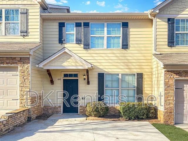 Welcome to this charming 3 bedroom, 2.5 bathroom home located in East Point, GA. This cozy house features a fireplace perfect for cozy nights, a walk in closet for ample storage, and a breakfast bar for casual dining.