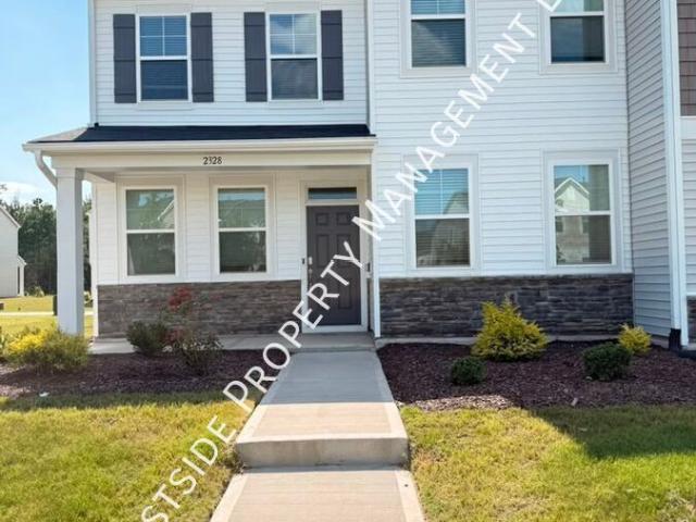 Welcome to this beautiful 4‑bed, 3‑bath end‑unit townhouse in the highly desirable Olde Towne community, access to resort‑style amenities!