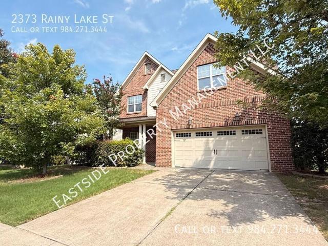 Welcome to this bright and modern 5 bedroom, 3.5 bathroom, 2 car garage single family house in one of Wake Forest's most convenient communities!