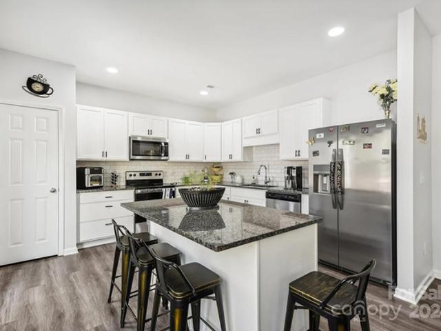 Welcome to this spacious 5 bedroom home, just 30 minutes from Charlotte Airport and Uptown Charlotte! This property features a large driveway and a 2 car garage, offering ample space for parking.