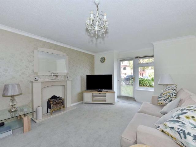 Well presented two bedroom ground floor apartment with allocated parking
