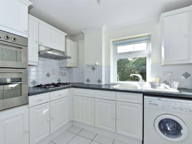 Well presented two bedroom ground floor apartment with allocated parking