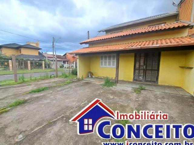 XG1029 Ótimo geminado de esquina em excelente localização no Cento de Imbé