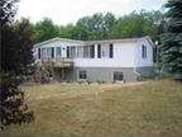Year round, private, spacious home located on 10 acres of prairie and woods with