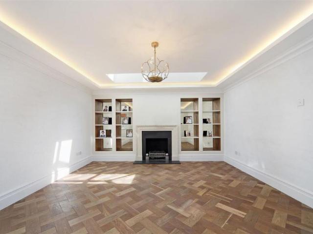 A meticulously designed family home set on one of Wimbledon's prestigious residential roads