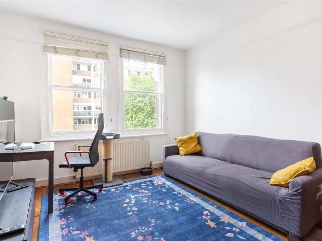 A modern top floor, two bedroom apartment in a well maintained terraced building