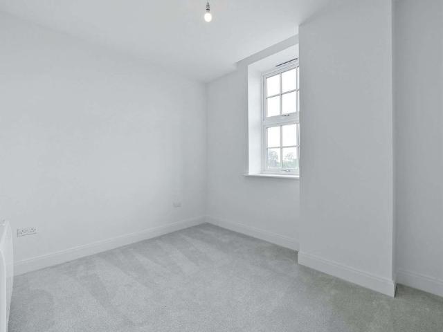 A modern two bedroom apartment in the Horlicks Factory Building by Berkeley Homes