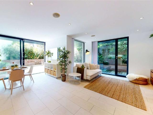 A modern, two bedroom garden apartment, within this sought after development