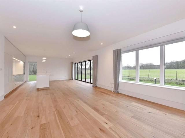 A modern and architecturally designed house of the highest order situated on an historic private country estate with wonderful rural views