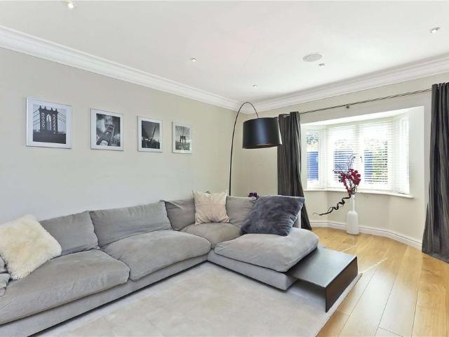 A modern family home in a popular Cobham residential road