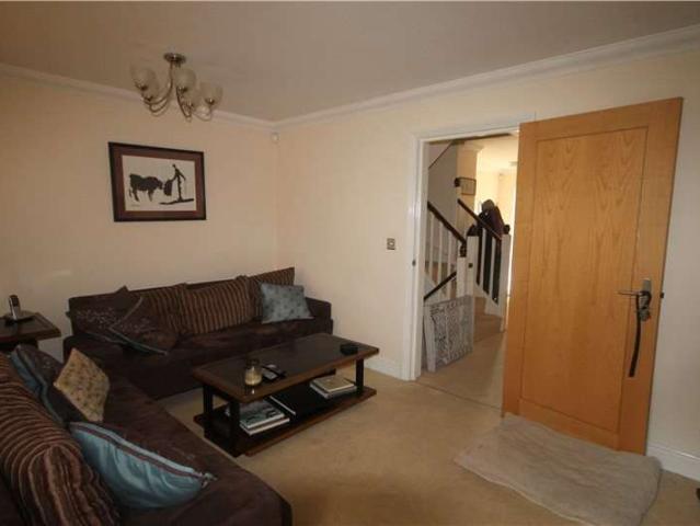 A modern four storey terraced town house with garden and parking