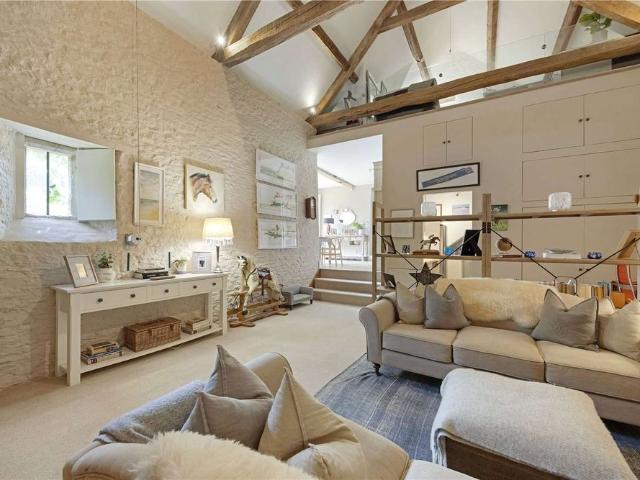 A most attractive Grade II Listed village house with exceptional interiors and beautifully landscaped gardens and grounds