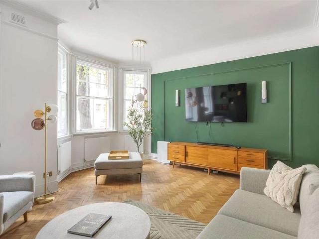 A newly refurbished and beautifully presented three bedroom ground floor apartment
