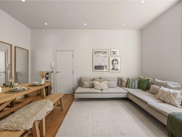 A newly refurbished two bedroom apartment spanning the ground and lower ground floors of this terraced house