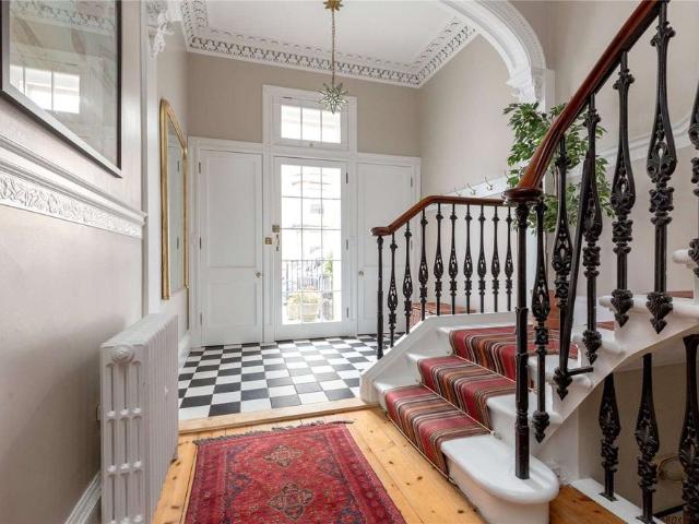 A beautiful five bedroom townhouse set over four floors with a private rear garden, available on an unfurnished basis, located on a popular and quiet residential street in the West End